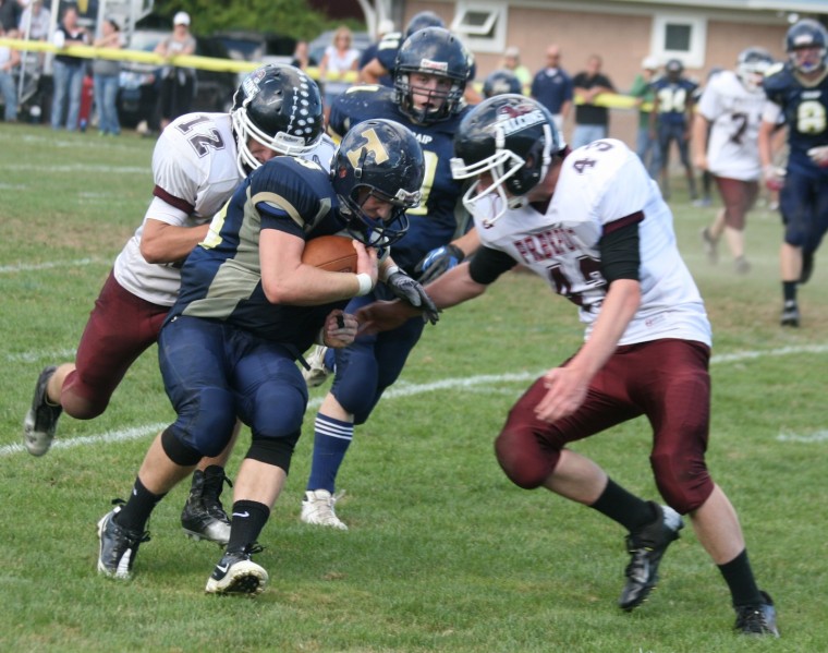 FOOTBALL: Traip tops Freeport