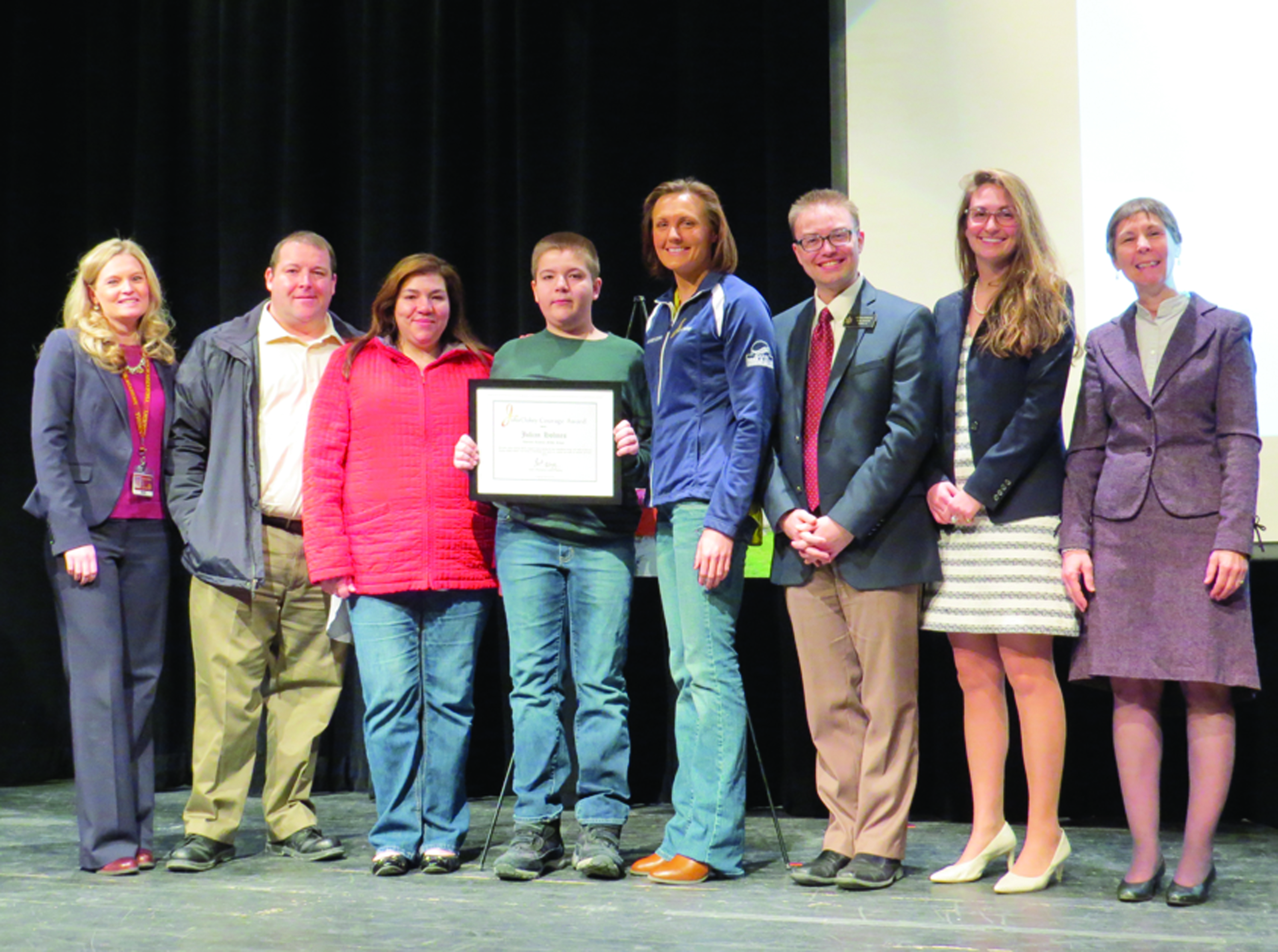 Olympian presents TAMS student with award