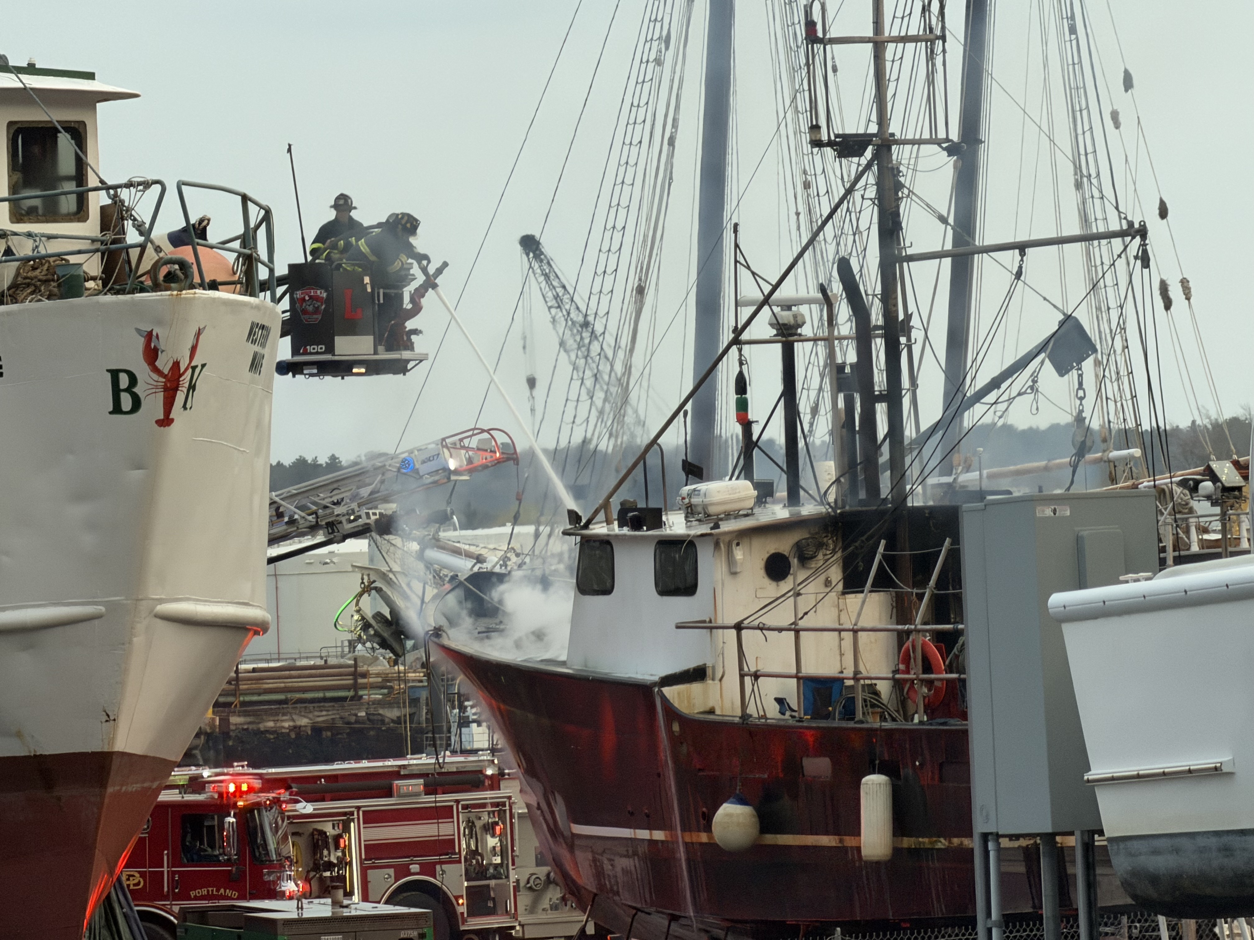 Firefighters combat Portland boat fire